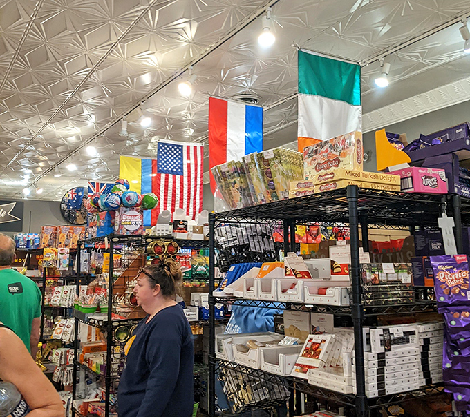 International flags hang proudly overhead, a United Nations of sugar where diplomatic relations involve only the sweetest negotiations.