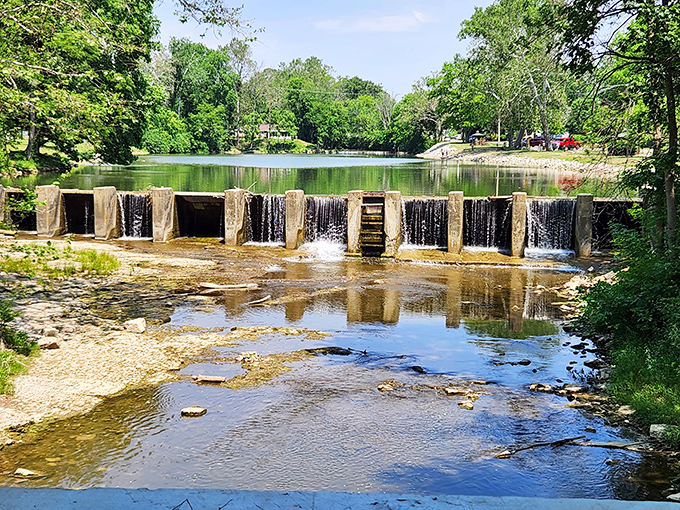 The waterfall dam creates nature's own soundtrack, better than any Spotify playlist you've got.