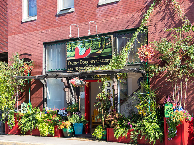 The Danny Doughty Gallery bursts with more color than a sunset after a summer storm, its plant-filled entrance a prelude to the creativity within.