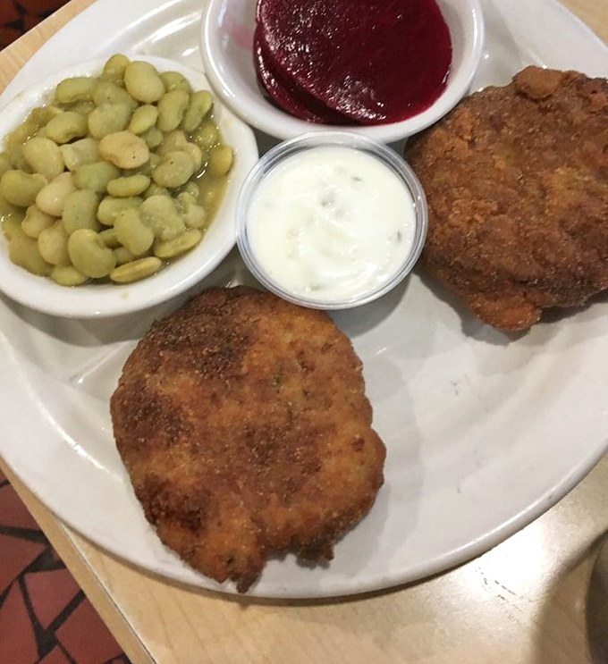 Comfort food, Florida-style. Lima beans, tartar sauce, and perfectly fried seafood create a plate that feels like a warm coastal hug.