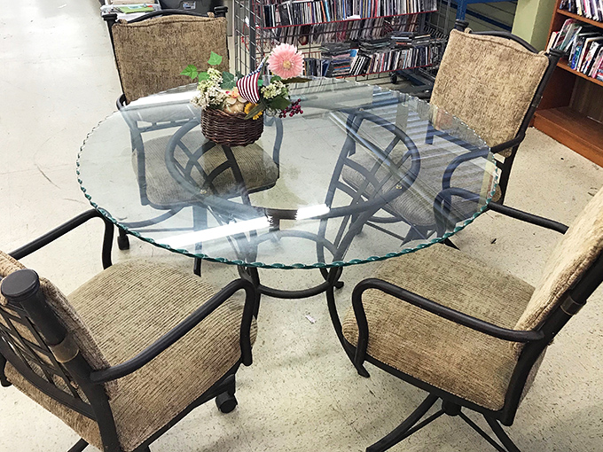 Dining set that whispers "civilized brunch conversations" without shouting "I paid full retail!" Glass tabletops&mdash;where elegance meets practicality.