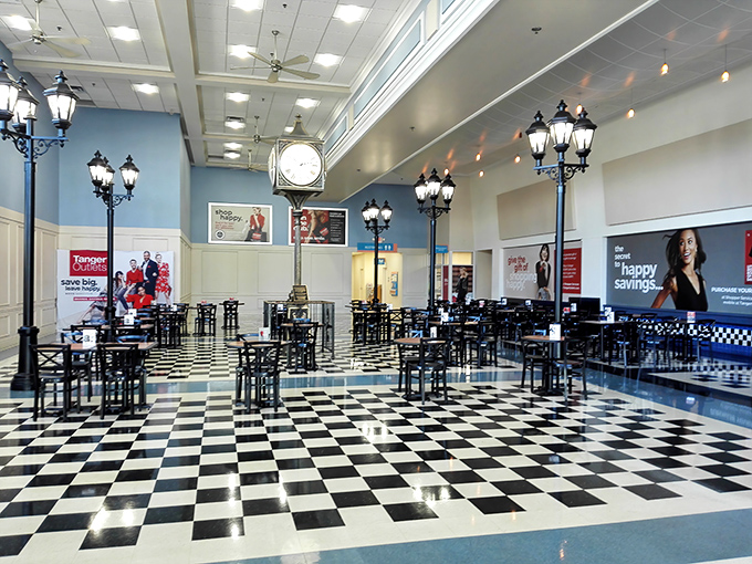 The food court's black-and-white checkerboard floor gives a retro diner feel to your shopping intermission. Refuel here before tackling the next wing of stores.