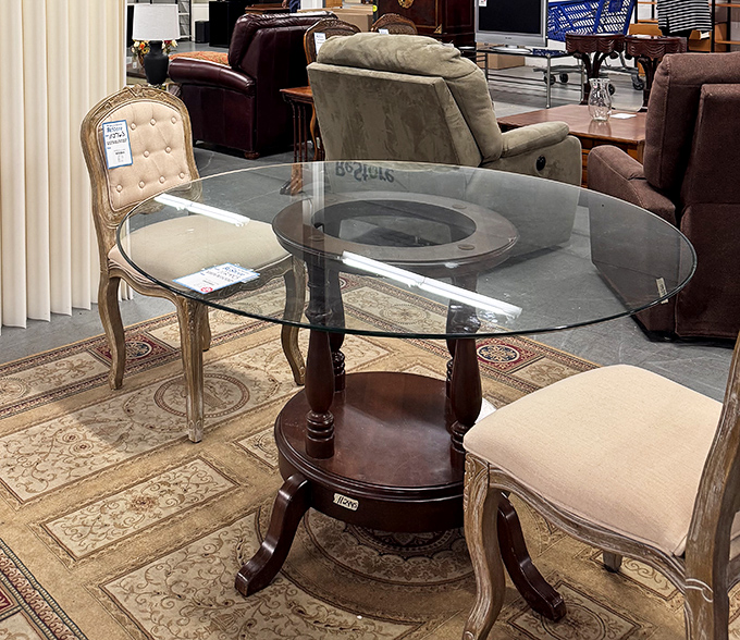 Elegant glass-top dining with vintage-inspired chairs&mdash;because eating takeout feels fancier when you're not balancing it on your lap while watching Jeopardy.