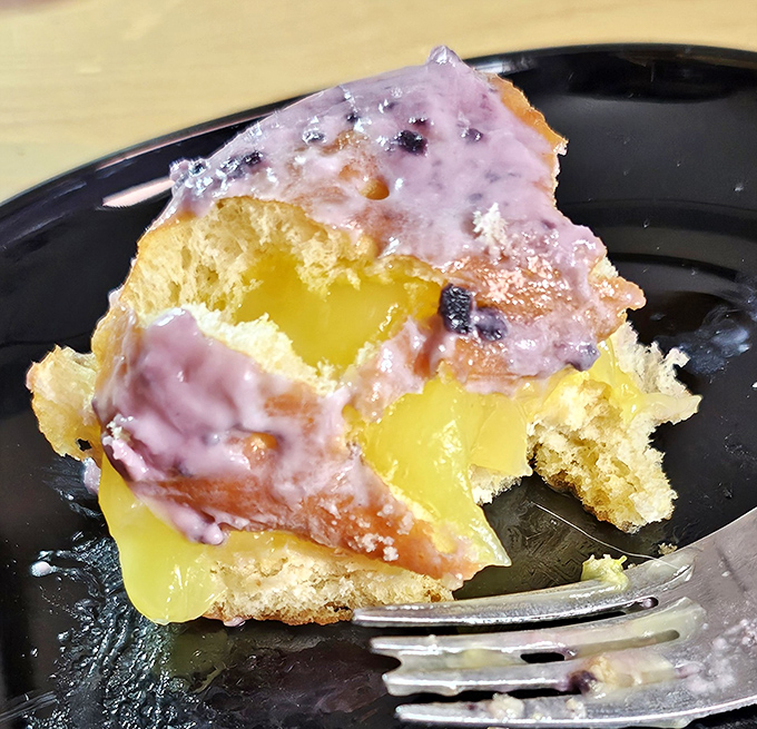 A donut so beautifully glazed and custard-filled, it practically demands its own Instagram photoshoot session immediately.