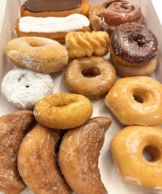 Donut diversity at its finest. From glazed classics to chocolate-topped wonders, this box is democracy in delicious action.