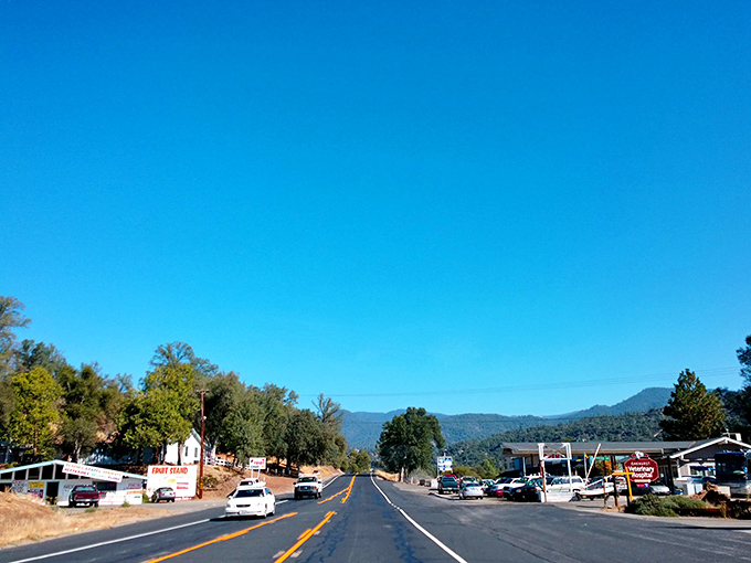 Where the road curves into town, every Oakhurst trip begins with mountain vistas that make GPS recalculating moments worthwhile.