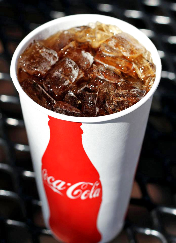 Even the drinks at Shank's keep it classic. That ice-cold Coca-Cola is the perfect companion to tame the cheesesteak heat.