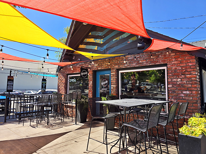 Colorful shade sails transform this patio into an outdoor living room. Al fresco dining where the mountain provides the entertainment.