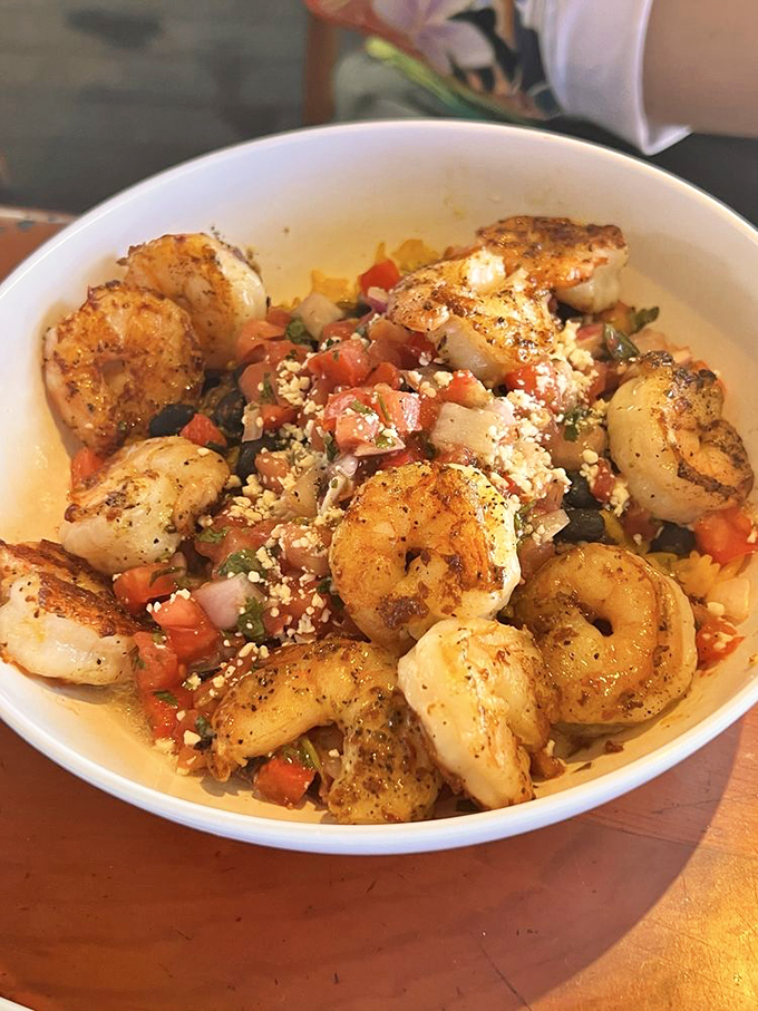 The Drunken Shrimp Bowl brings together blackened shrimp and fresh pico de gallo in a relationship more perfect than most reality TV couples.