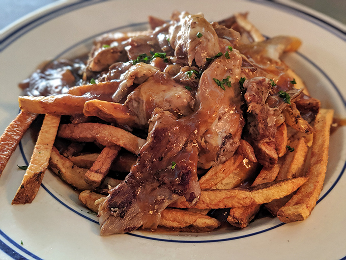 Poutine gets the duck confit treatment, turning humble fries into a masterpiece. This is what potatoes dream of becoming when they grow up.