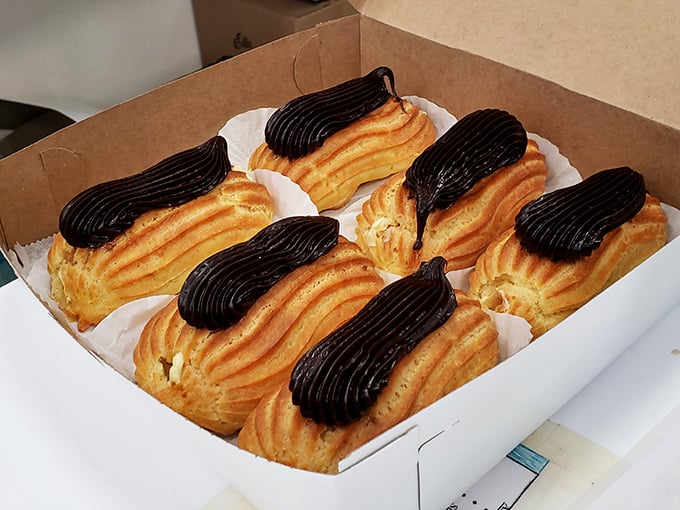 These eclairs aren't just pastries; they're time machines to childhood joy, upgraded with adult-worthy chocolate and perfect pastry engineering.