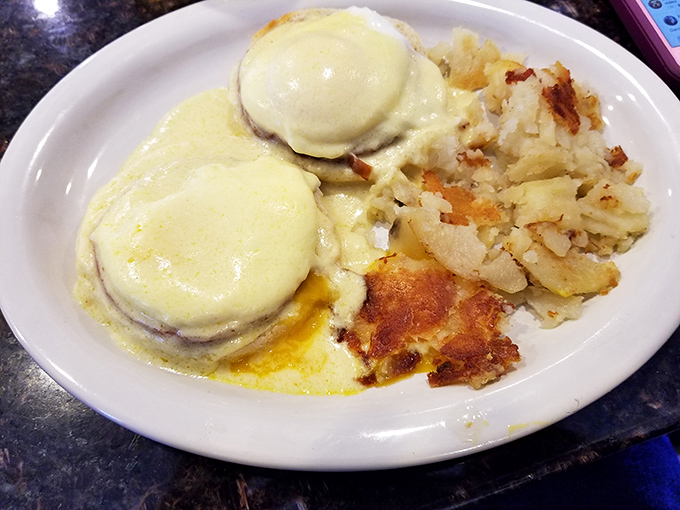 Eggs Benedict with hollandaise so rich it could apply for its own tax bracket.