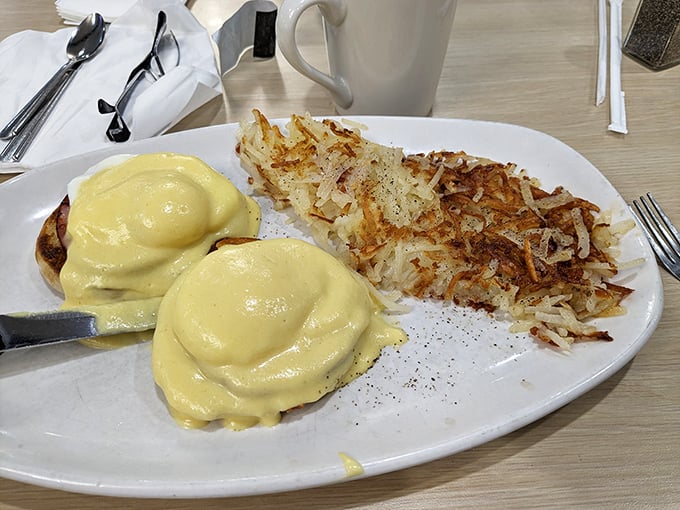 Eggs Benedict: where hollandaise sauce flows like liquid gold over perfectly poached eggs, creating breakfast's answer to the crown jewels.