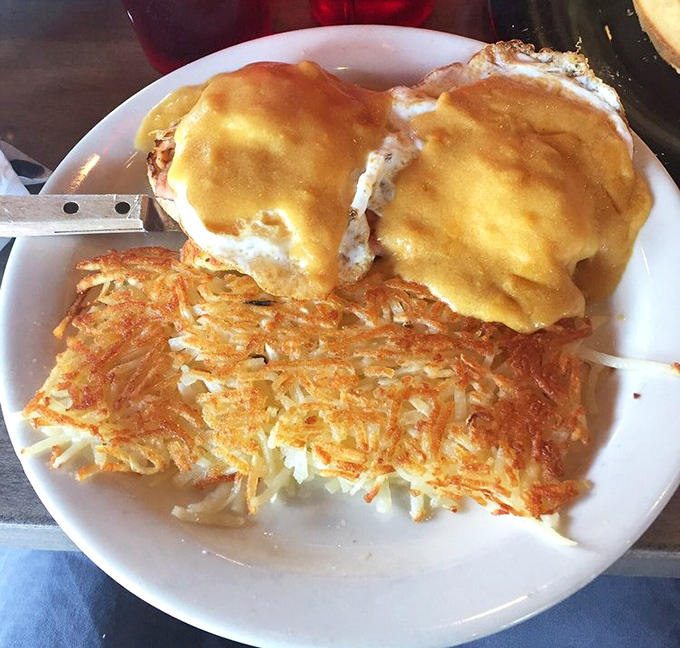 Eggs Benedict with perfectly crispy hash browns &ndash; the breakfast equivalent of wearing a tuxedo with really comfortable shoes.