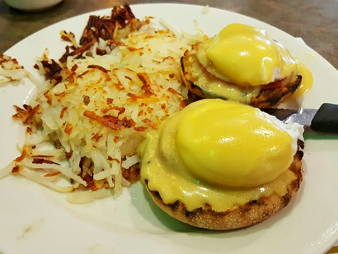 Eggs Benedict with perfectly golden hash browns&mdash;the breakfast equivalent of hitting the jackpot before your first cup of coffee. 