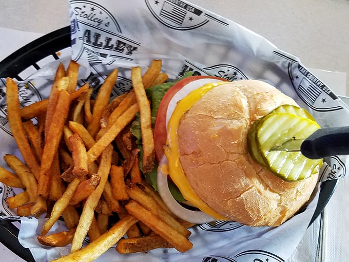 The burger that launched a thousand napkins. Golden fries and a perfectly stacked sandwich&mdash;the kind of meal that makes conversation optional.