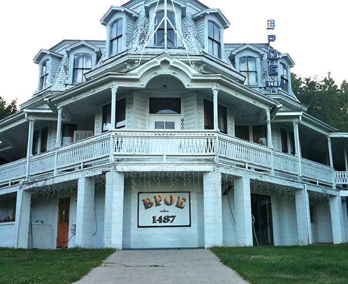 The historic Elks Lodge building wears its BPOE sign proudly, a reminder of when fraternal organizations were the original social networks.