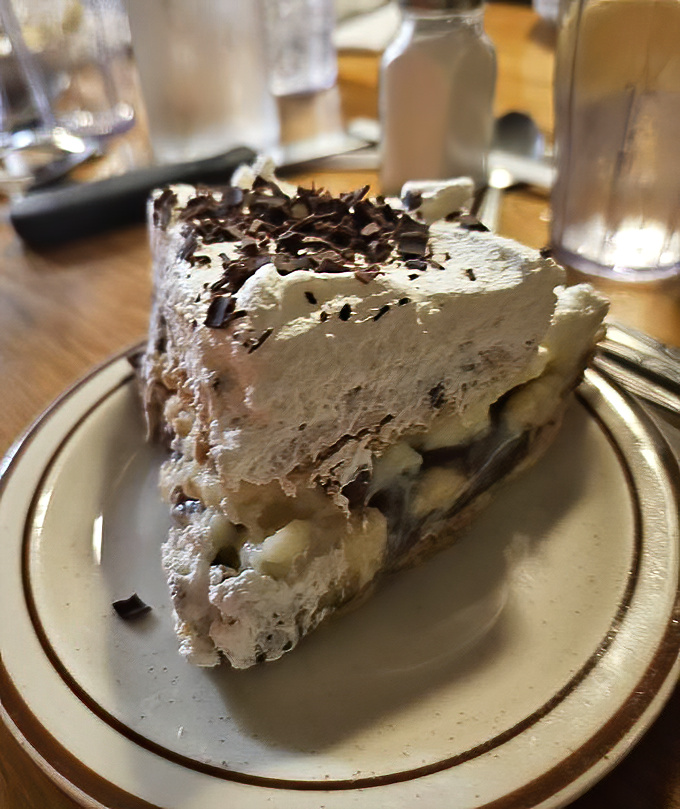 Not your ordinary cream pie&mdash;this towering creation with chocolate shavings looks like what Elvis would order for his last meal.