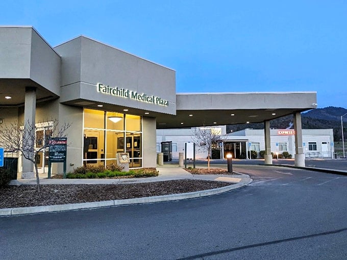 Fairchild Medical Center provides essential healthcare services with mountain views that beat any hospital TV channel. Who needs daytime soaps with scenery like this?
