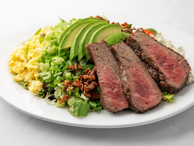 A Cobb salad reimagined with slices of steak so perfectly pink, even salad skeptics will put down their steak knives and dive in.