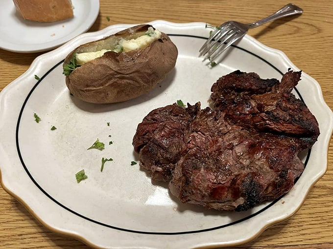 Filet mignon and a loaded baked potato&mdash;the Fred Astaire and Ginger Rogers of steakhouse pairings, dancing perfectly together on a simple white plate.