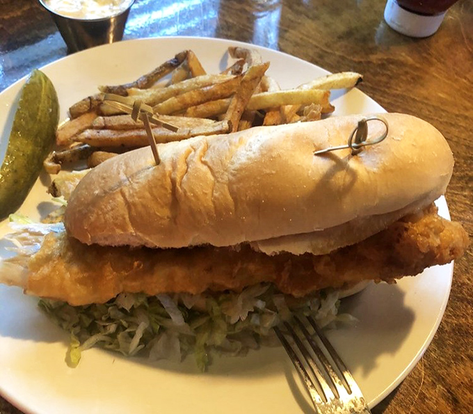 The fish sandwich that launched a thousand road trips. Crispy, golden perfection nestled in a pillowy bun with fries that demand to be noticed.