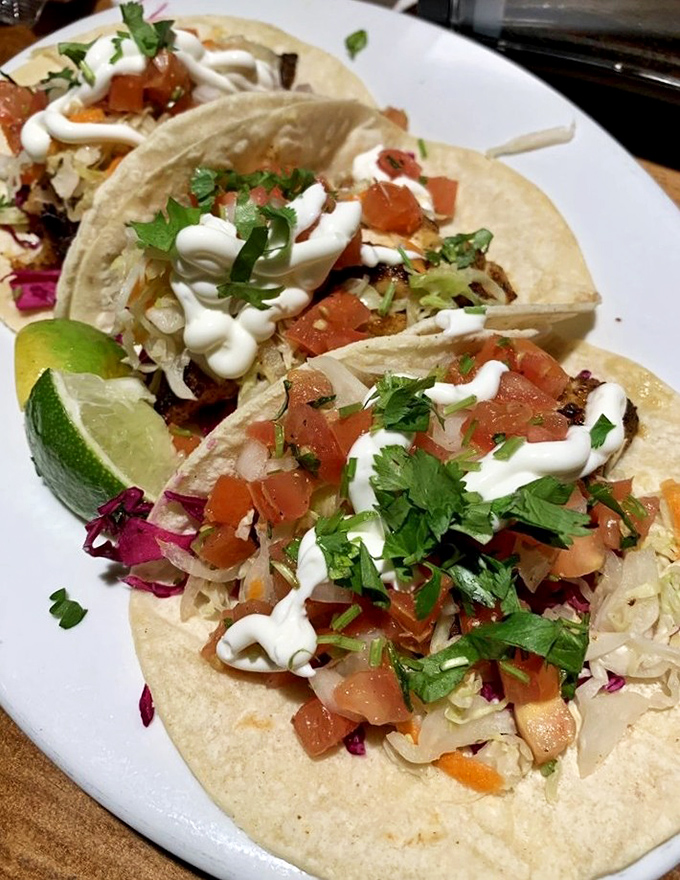 Fish tacos dressed for success with fresh toppings and a squeeze of lime&mdash;like a beach vacation wrapped in a tortilla.