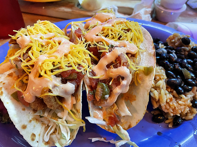 Tacos that tell a story of sea and land coming together in perfect harmony, with a side of beans that didn't come from any can.