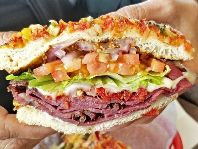 This isn't just a sandwich—it's a masterclass in melted cheese and perfectly toasted bread, held together with colorful toothpicks like tiny flavor flags.