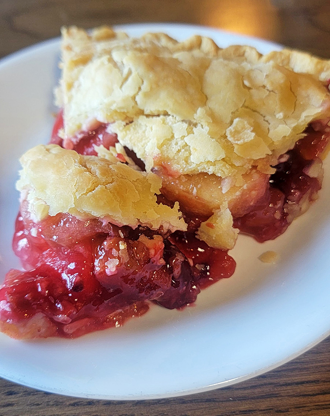 Berry pie that makes you question every other dessert decision you've ever made. That flaky crust deserves its own fan club.