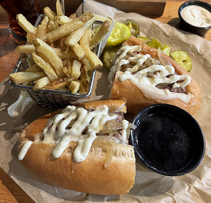 A French Dip sandwich that demands to be dunked, with fries so perfectly golden they deserve their own Instagram account.