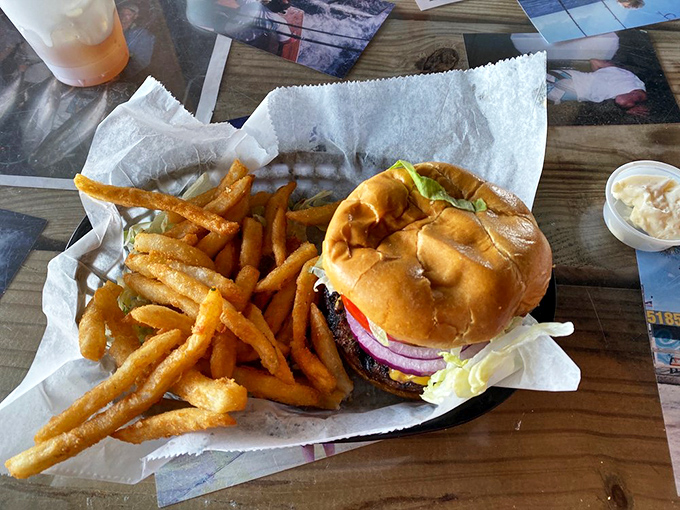 Golden fries and a burger that doesn't need fancy aioli or artisanal buns to make you forget your table manners.