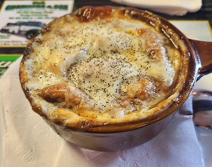 French onion soup with that perfect cheese cap &ndash; stretchy, browned, and ready to be broken into like a delicious savory cr&egrave;me br&ucirc;l&eacute;e.