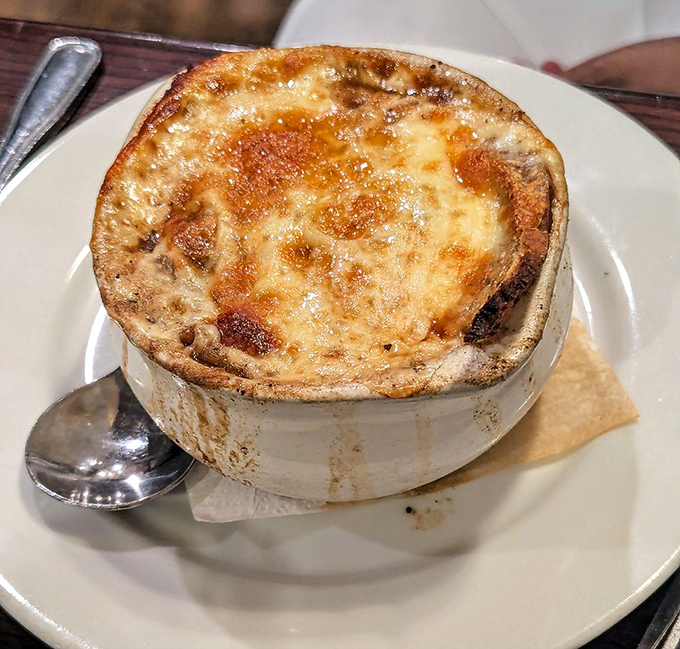 The star of the show&mdash;French onion soup with that glorious crown of golden, bubbling cheese. Worth the inevitable chin dribble and momentary loss of dignity.