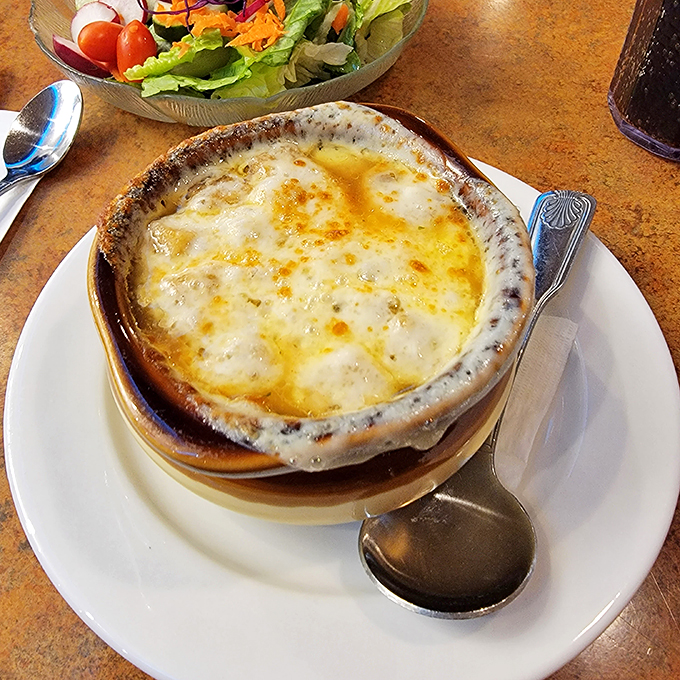 French onion soup with a cheese cap so perfectly browned it deserves its own Instagram account. Comfort in a crock, one spoonful at a time.
