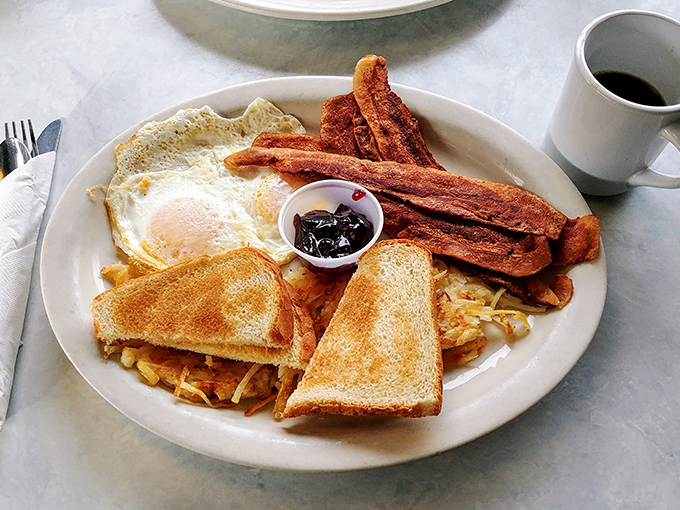 The breakfast trinity&mdash;eggs, bacon, and toast&mdash;elevated to art form. Simple perfection that makes you wonder why you'd ever eat anything else.