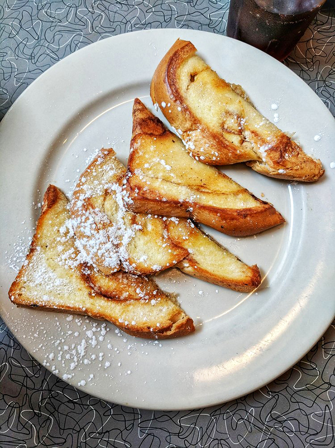 Cinnamon French toast dusted with powdered sugar&mdash;the breakfast that thinks it's dessert, and nobody's complaining about it.