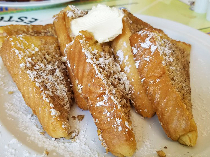 French toast that's achieved the impossible balance of crispy exterior and custardy interior &ndash; the breakfast equivalent of hitting the lottery.