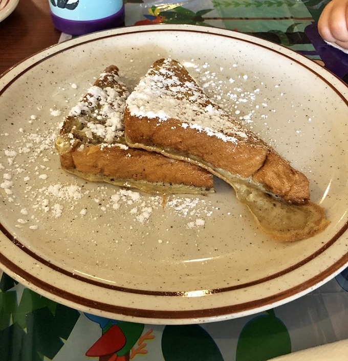 French toast dusted with powdered sugar, waiting patiently for your maple syrup baptism. Breakfast dessert is still breakfast, right?