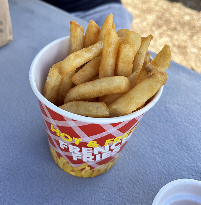 Golden fries that achieve that perfect balance between crispy exterior and fluffy, pillowy interior perfection.