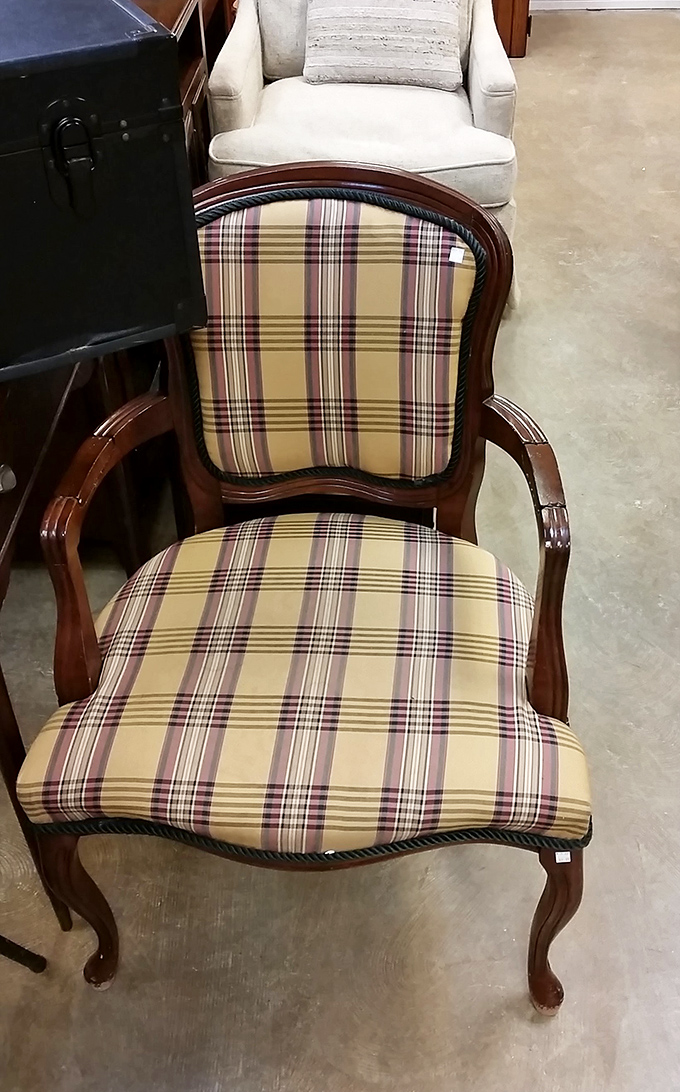 This plaid armchair has "distinguished professor's study" written all over it, just waiting for someone to look scholarly in it.