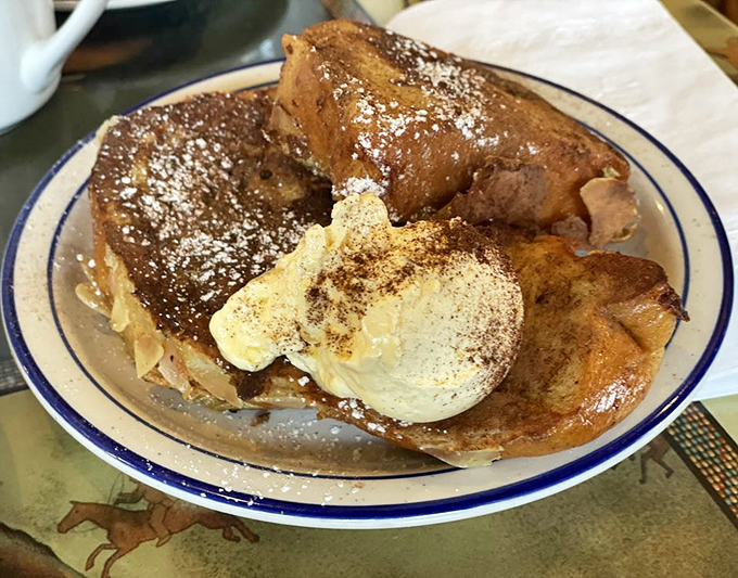 French toast that's lived its best life&mdash;thick-cut, golden-brown, and dusted with enough cinnamon and sugar to make your dentist wince approvingly.