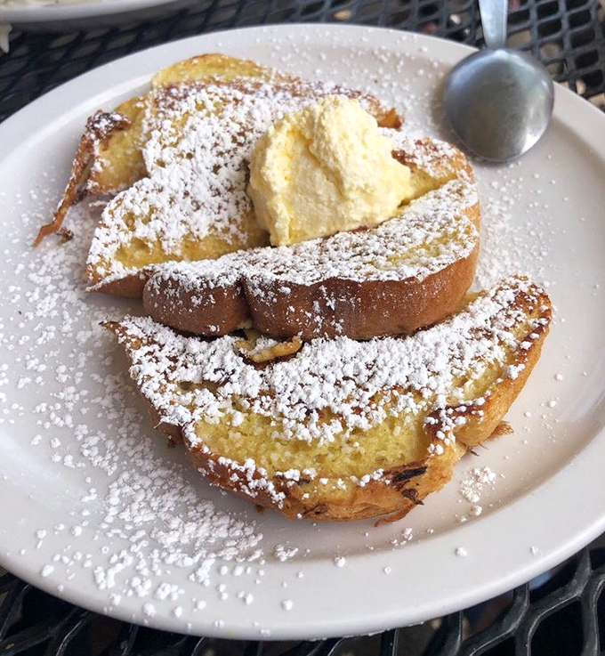 French toast that makes you question why anyone would ever settle for regular toast again &ndash; dusted with powdered sugar like fresh Missouri snow.