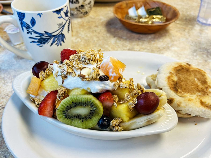 A fruit and yogurt parfait that somehow makes virtue feel indulgent. Those fresh berries and crunchy granola are having their own little garden party.