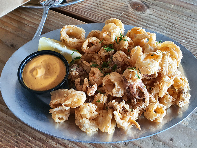 Fried calamari that's actually tender, not rubber bands in disguise. The kind worth fighting your tablemates for the last golden ring.