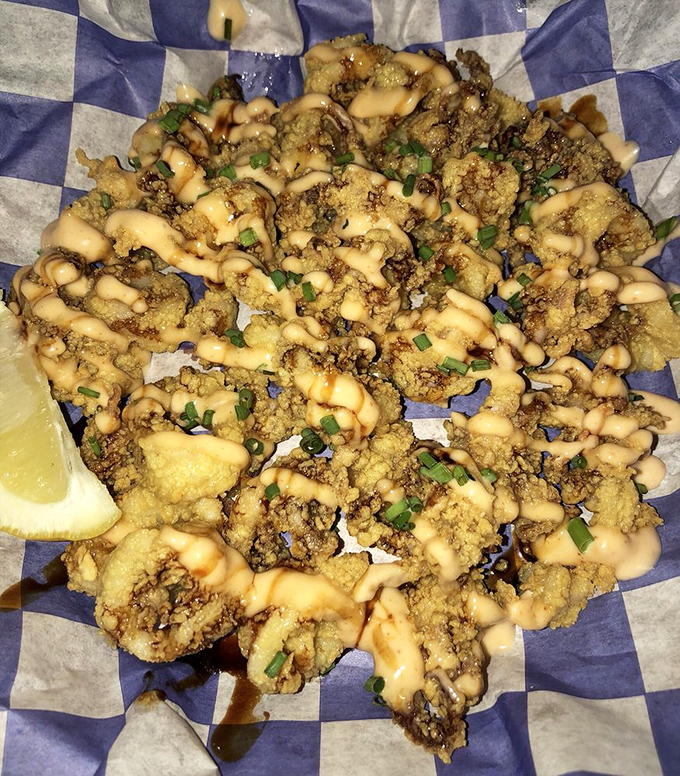 Fried calamari so tender and perfectly seasoned, it practically melts on your eager tongue.