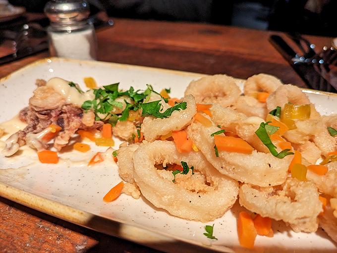 Calamari that doesn't hide behind excessive breading&mdash;a refreshing change from the rubber-band texture that haunts lesser establishments. The colorful garnish isn't just for show.