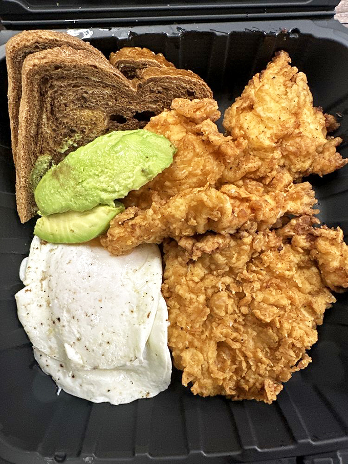 Fried chicken that achieves the impossible trifecta: shatteringly crisp exterior, juicy interior, and seasoning that makes your taste buds dance.