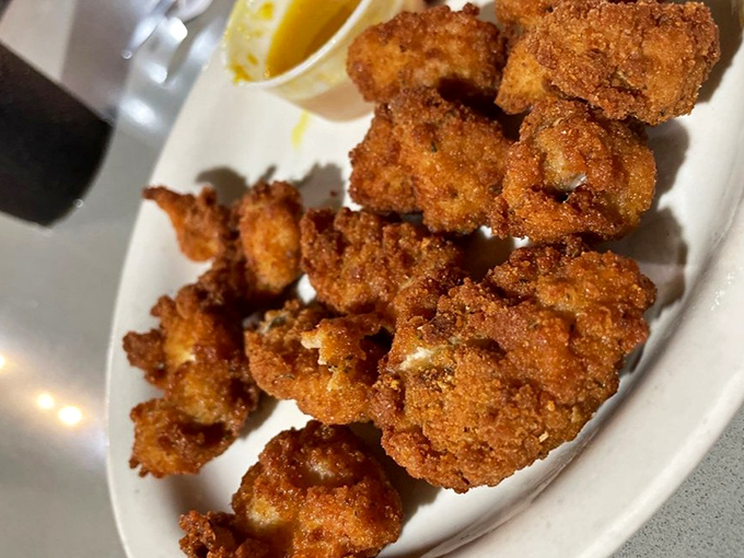 Fried gator tail: the ultimate Florida conversation starter. Crispy, tender, and guaranteed to make your friends back home both jealous and slightly concerned.