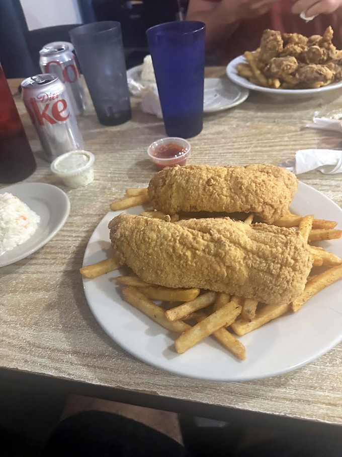 Forget fancy plating&mdash;this fried grouper and fries combo is the honest-to-goodness seafood experience Florida locals guard like a secret fishing spot.